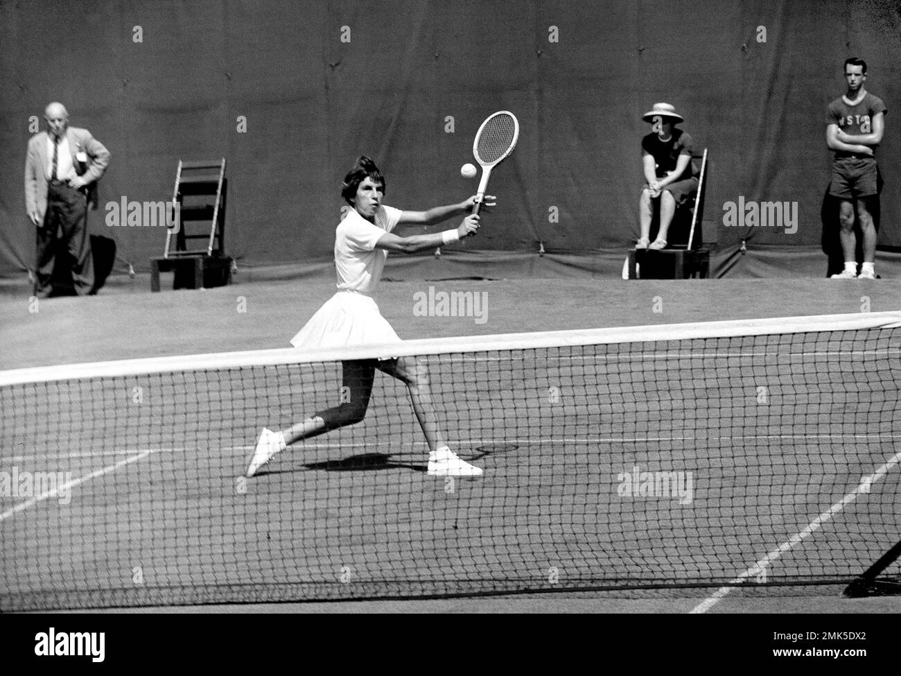 Brazil's Maria Bueno uses backhand to put ball away in second set of ...