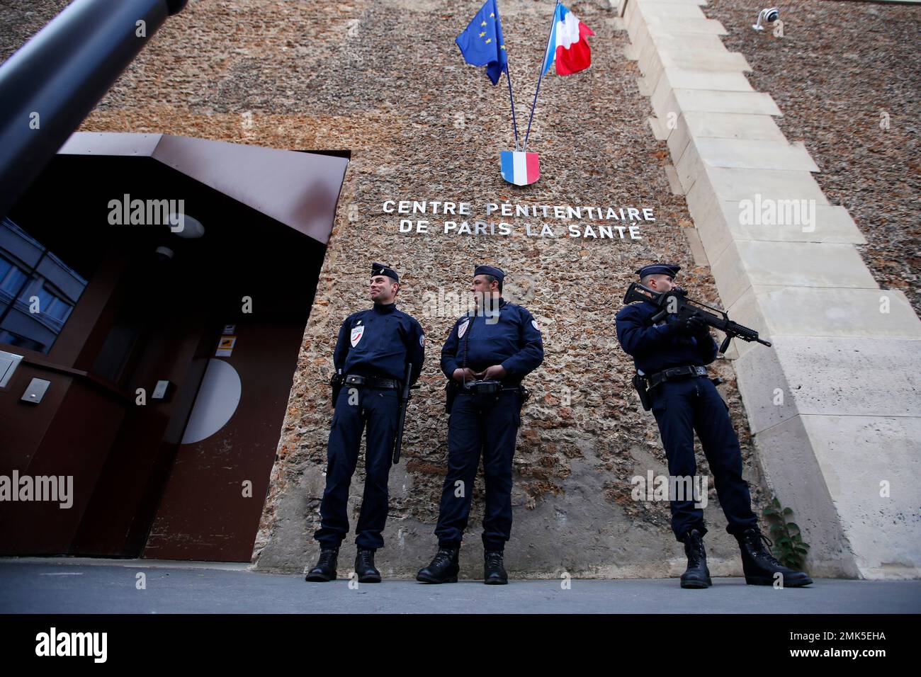 French police officers stand in front of Paris' mythic La Sante prison ...