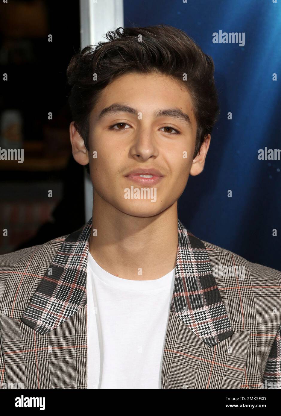 Marcel Ruiz arrives at the LA Premiere of "Breakthrough" at the Regency ...