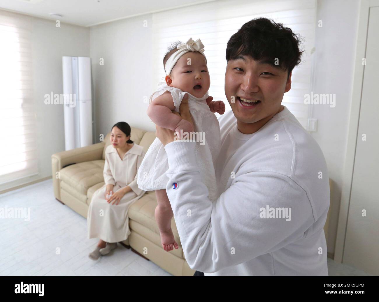 In this April 9, 2019, photo, Lee Dong Kil holds his daughter Lee Yoon ...