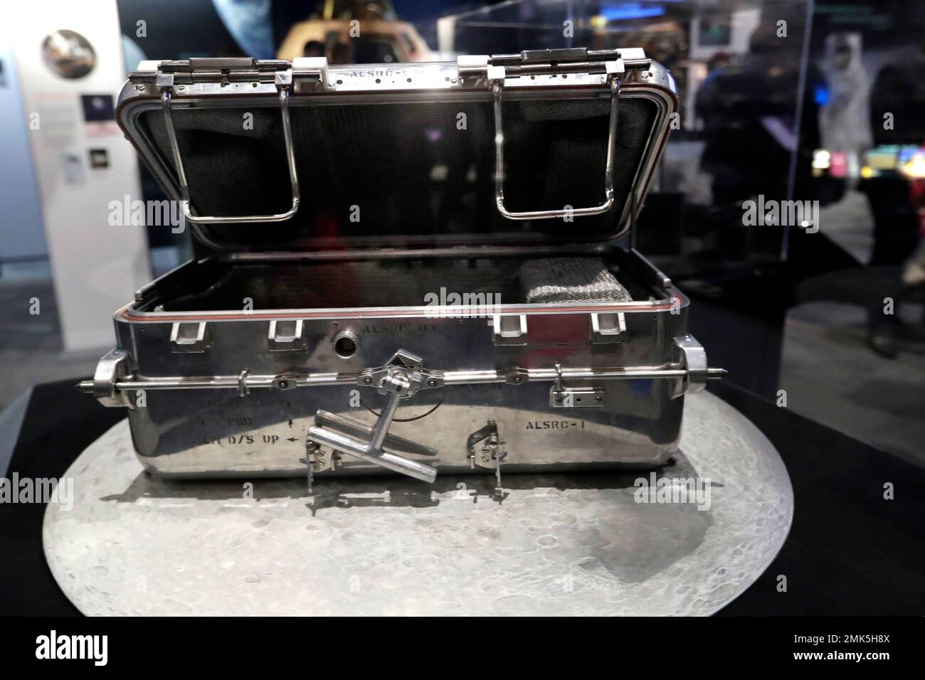 A lunar sample return container, for storing moon rocks, is displayed ...