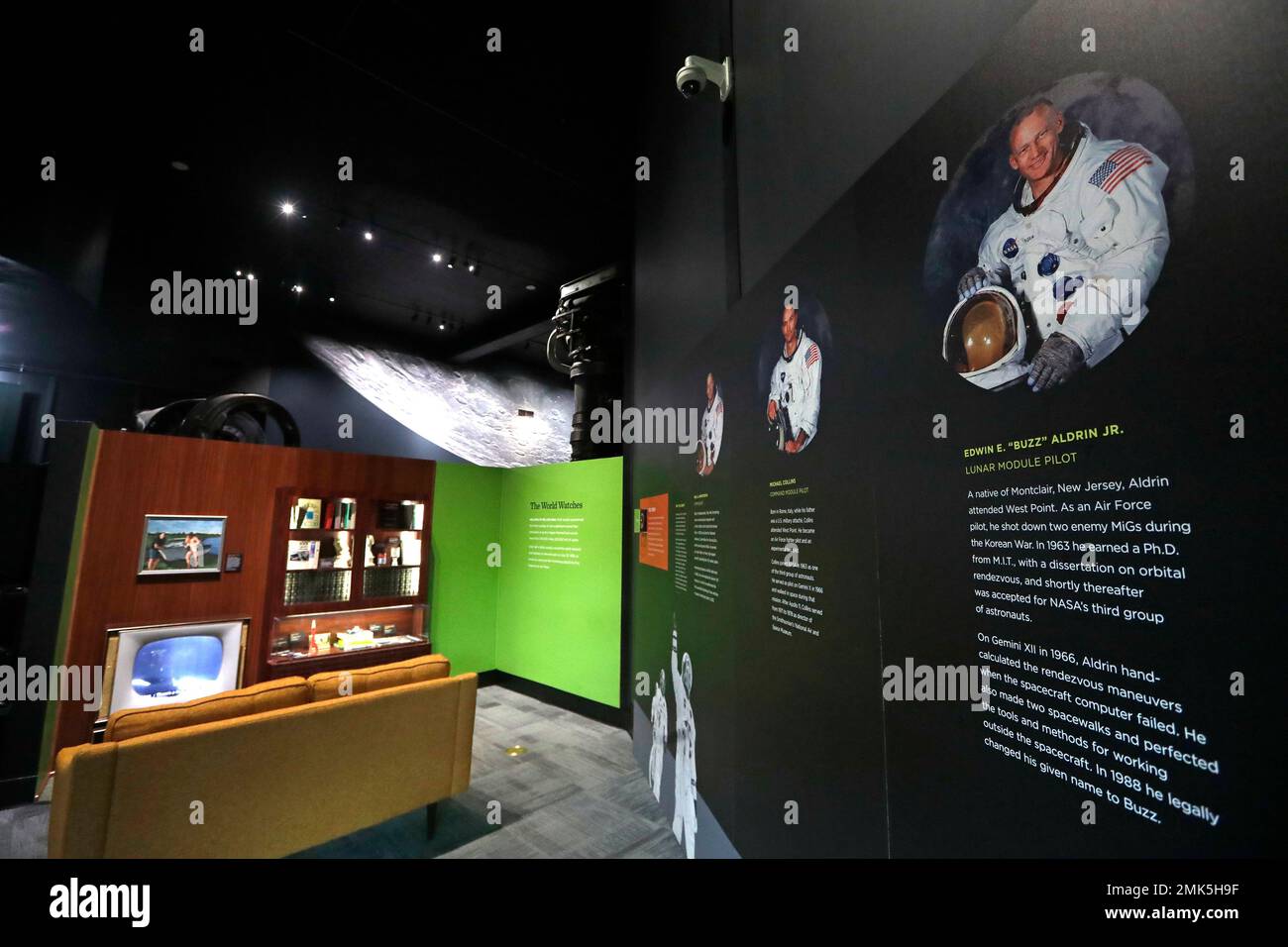 Portraits of Apollo 11 astronauts and a 1960's-era living room are ...