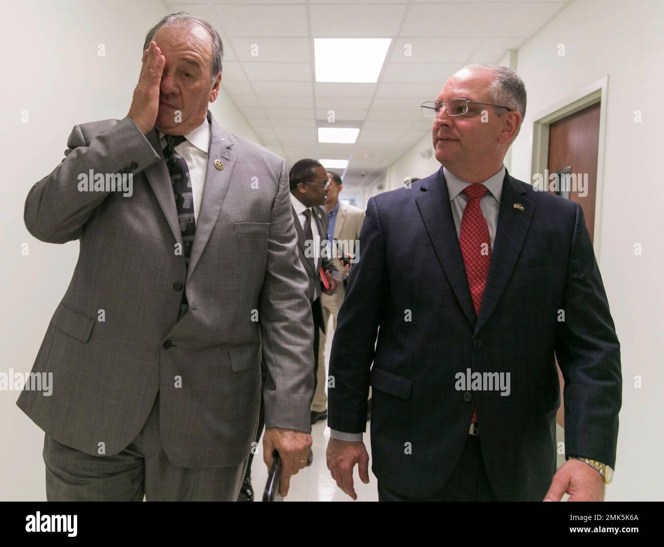 St. Landry Parish Sheriff Bobby Guidroz rubs his face as Louisiana Gov ...