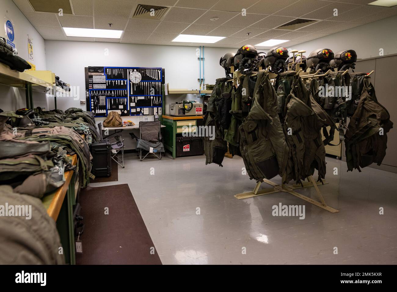 Flight equipment hangs in the aircrew flight equipment room at Royal ...