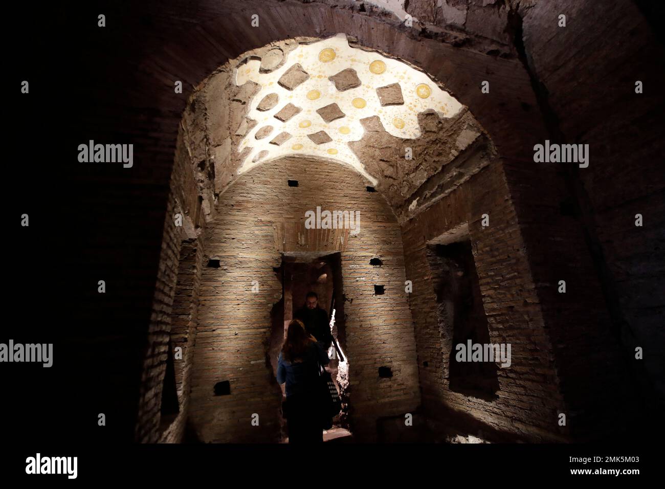 People walk in the Domus Transitoria, the first imperial palace of ...