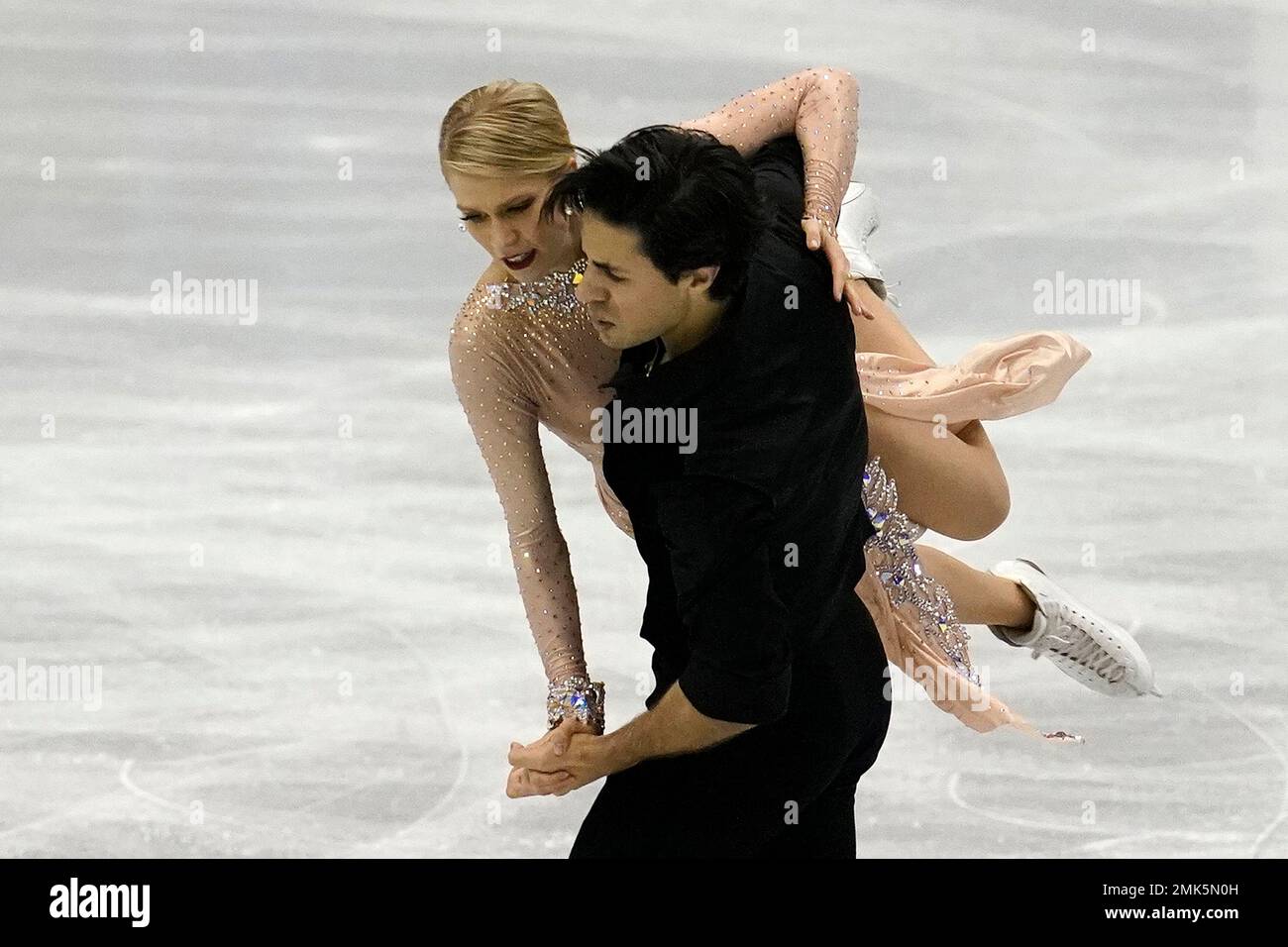 Canada's Kaitlyn Weaver and Andrew Poje perform their ice dance rhythm dance during the ISU ...