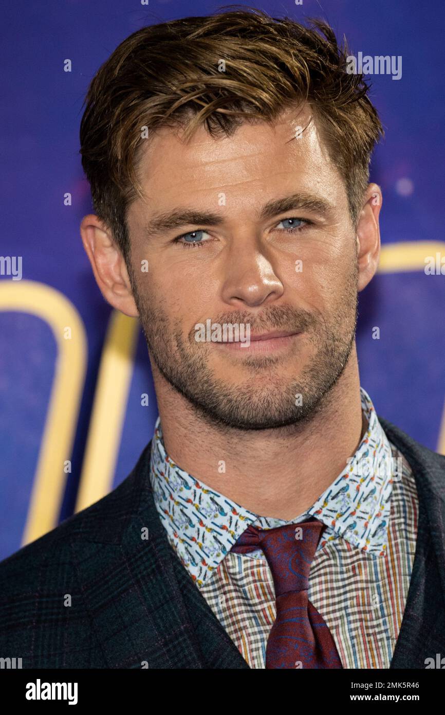 Actor Chris Hemsworth poses for photographers upon arrival at a fan ...