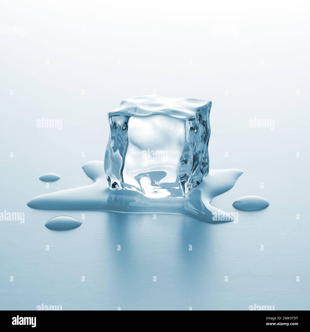 melting cold ice cube Stock Photo - Alamy