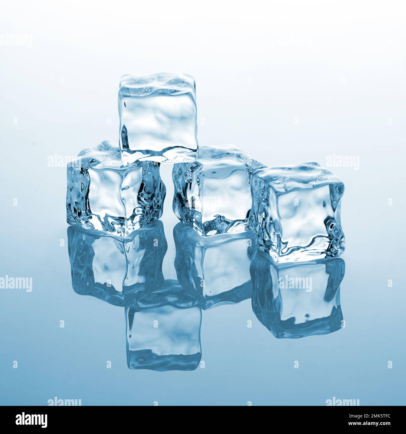 Crystal clear cube of ice Stock Photo - Alamy