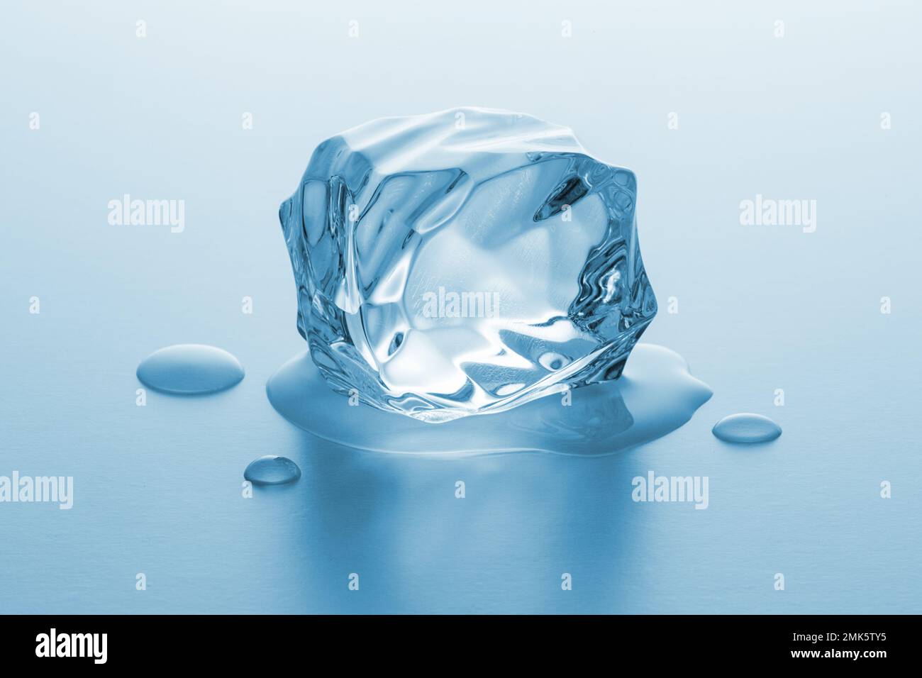 melting chunk of ice Stock Photo - Alamy