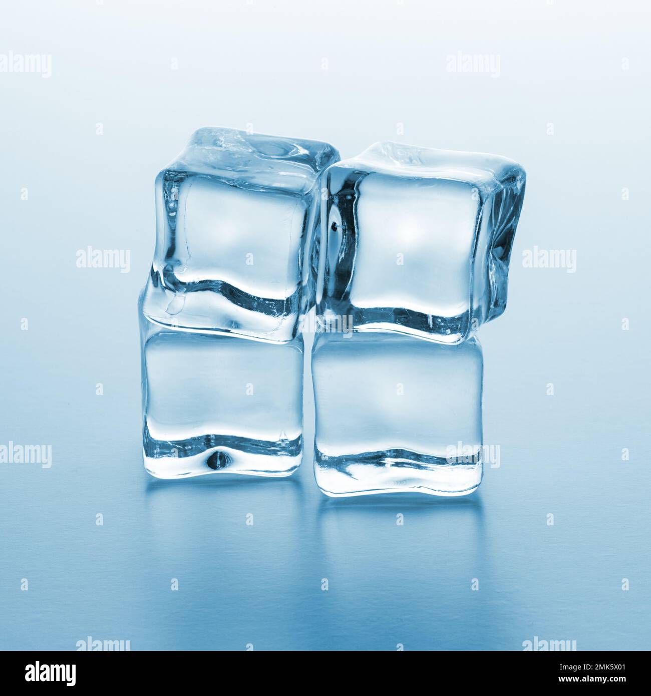 four ice cubes Stock Photo - Alamy