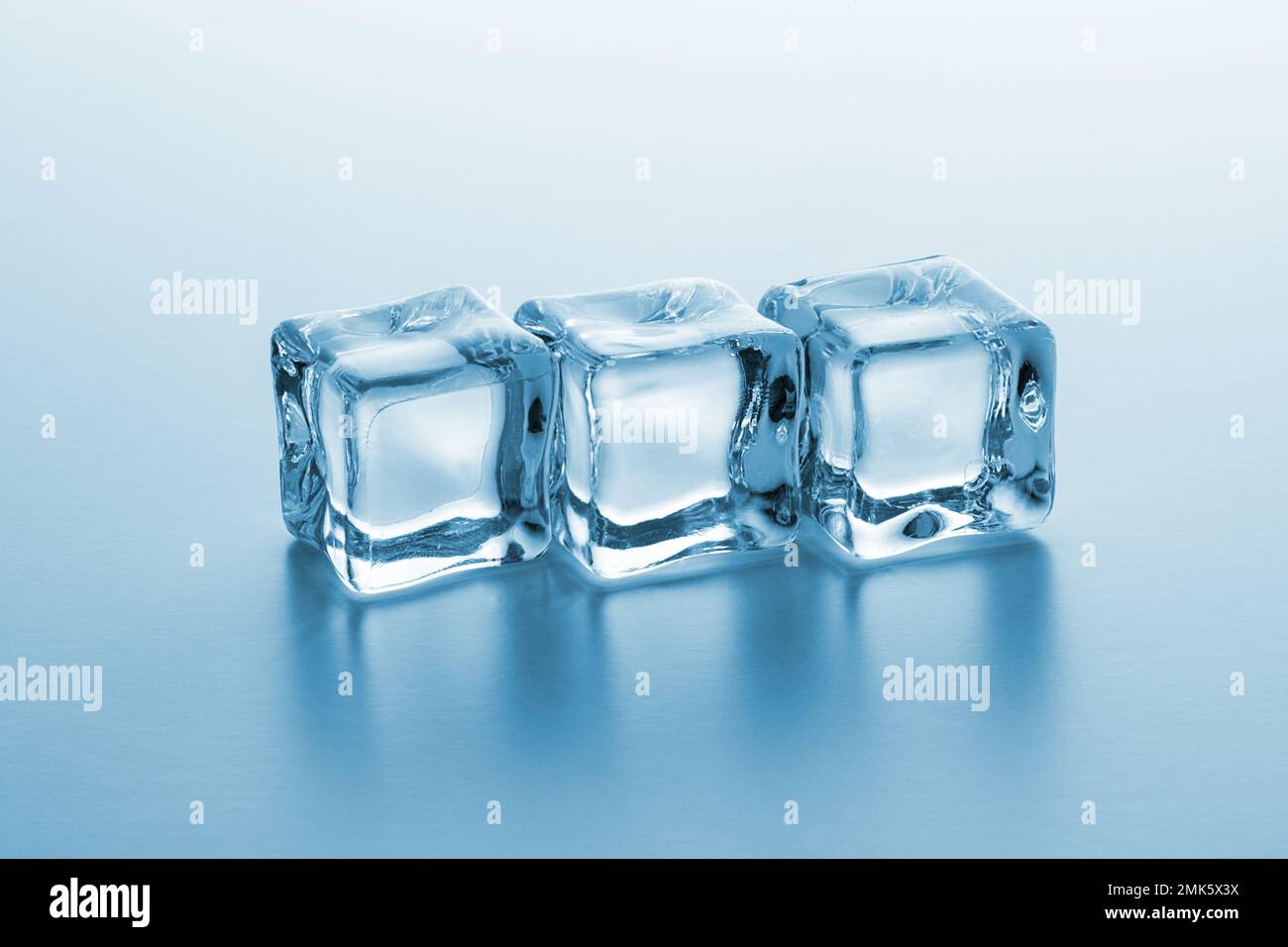 ice cubes in a line Stock Photo - Alamy
