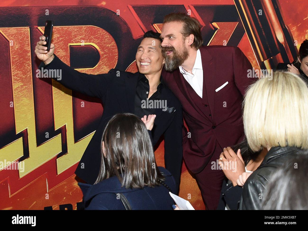 Actors Daniel Dae Kim, left, and David Harbour take a selfie together ...