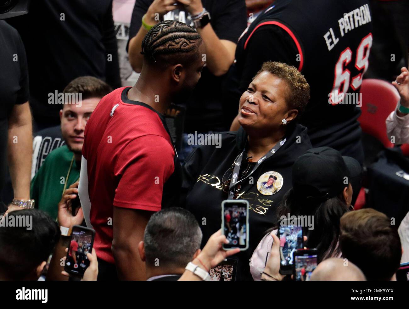 Miami Heat guard Dwyane Wade, left, hugs his mother Jolinda Wade during ...
