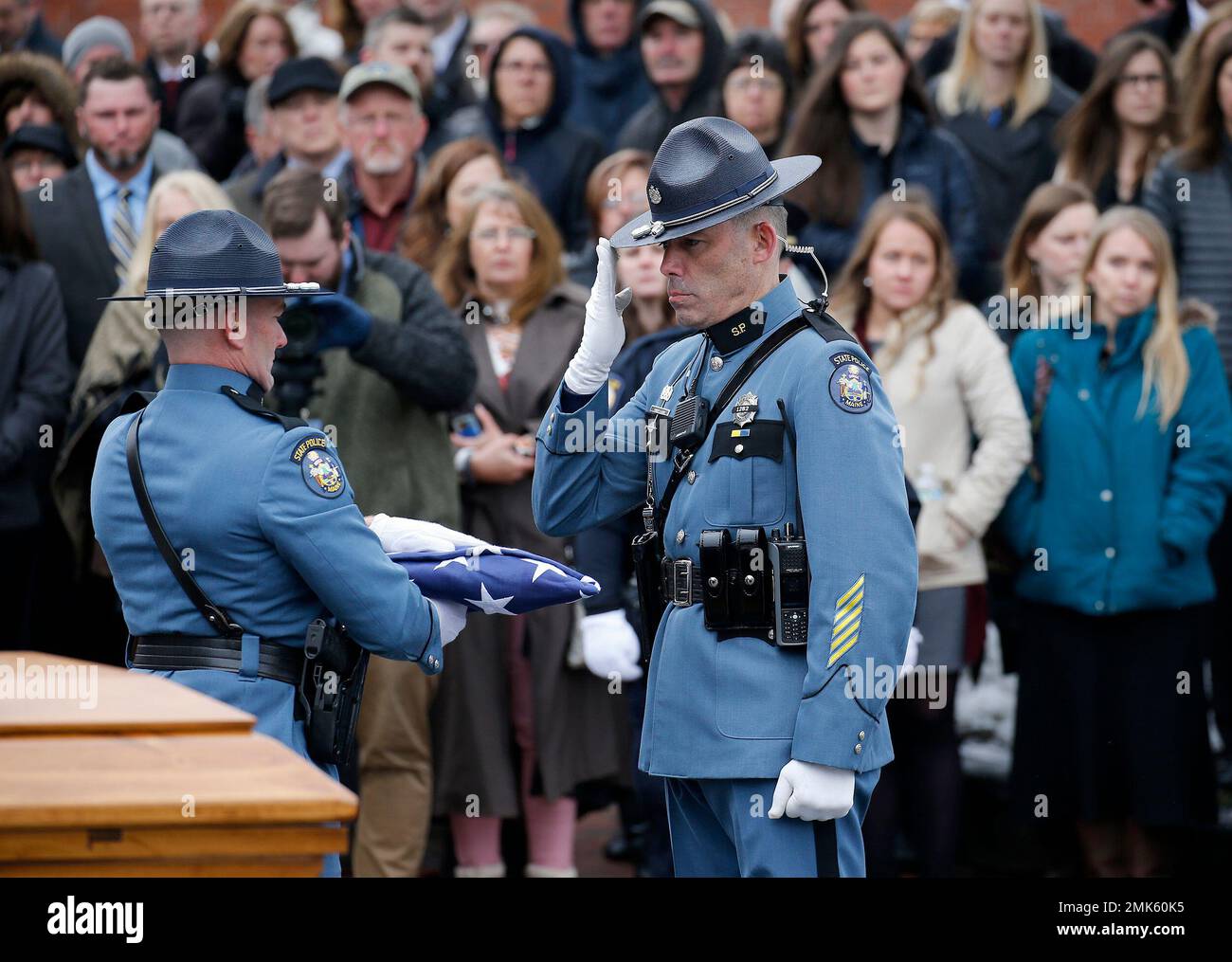 Maine State Police prepare the flag for presentation to Hillary ...