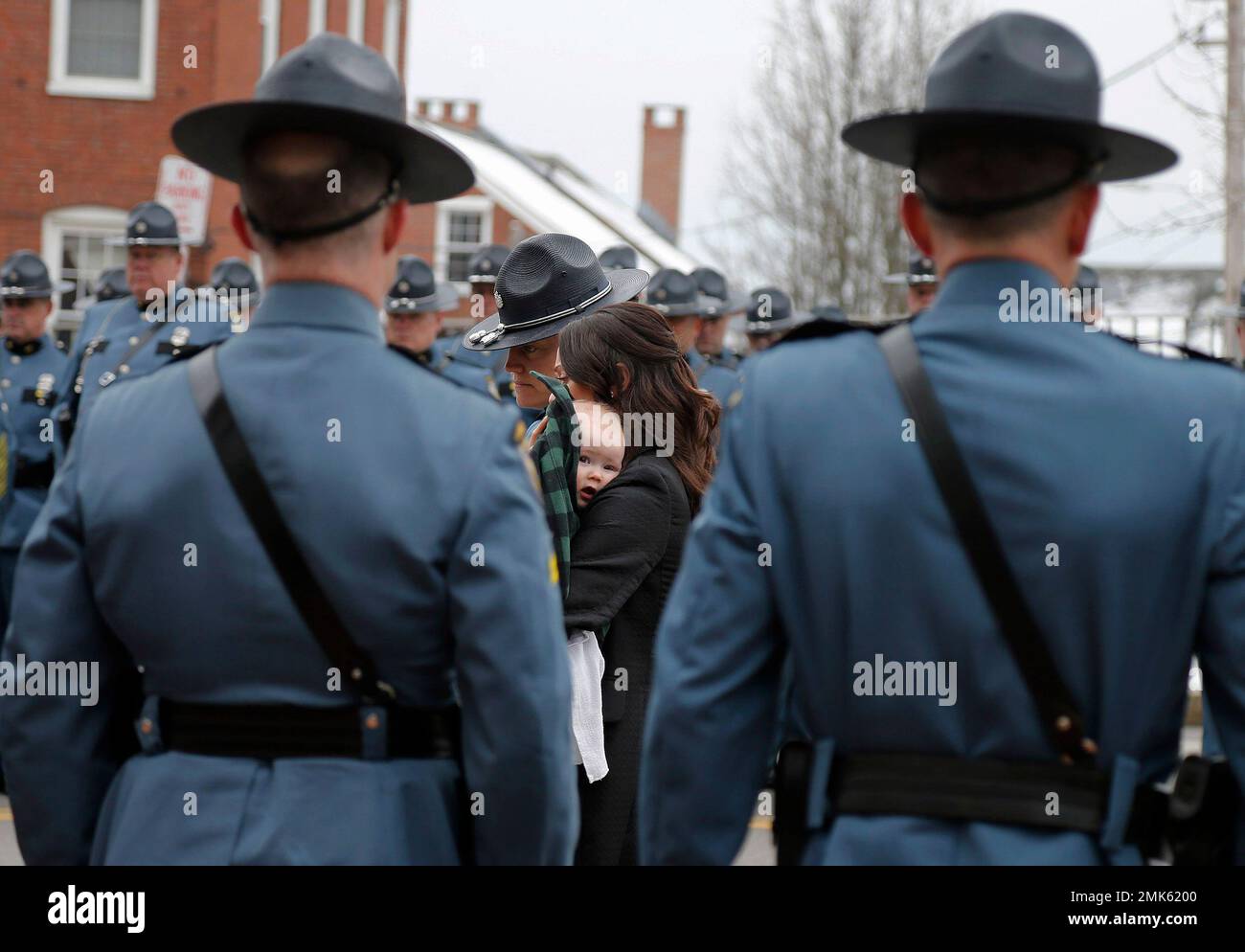 Hillary Campbell, center, wife of Maine State Police detective Ben ...