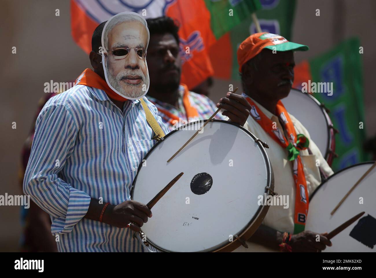 A supporter of India's ruling Bharatiya Janata Party (BJP) wearing a ...