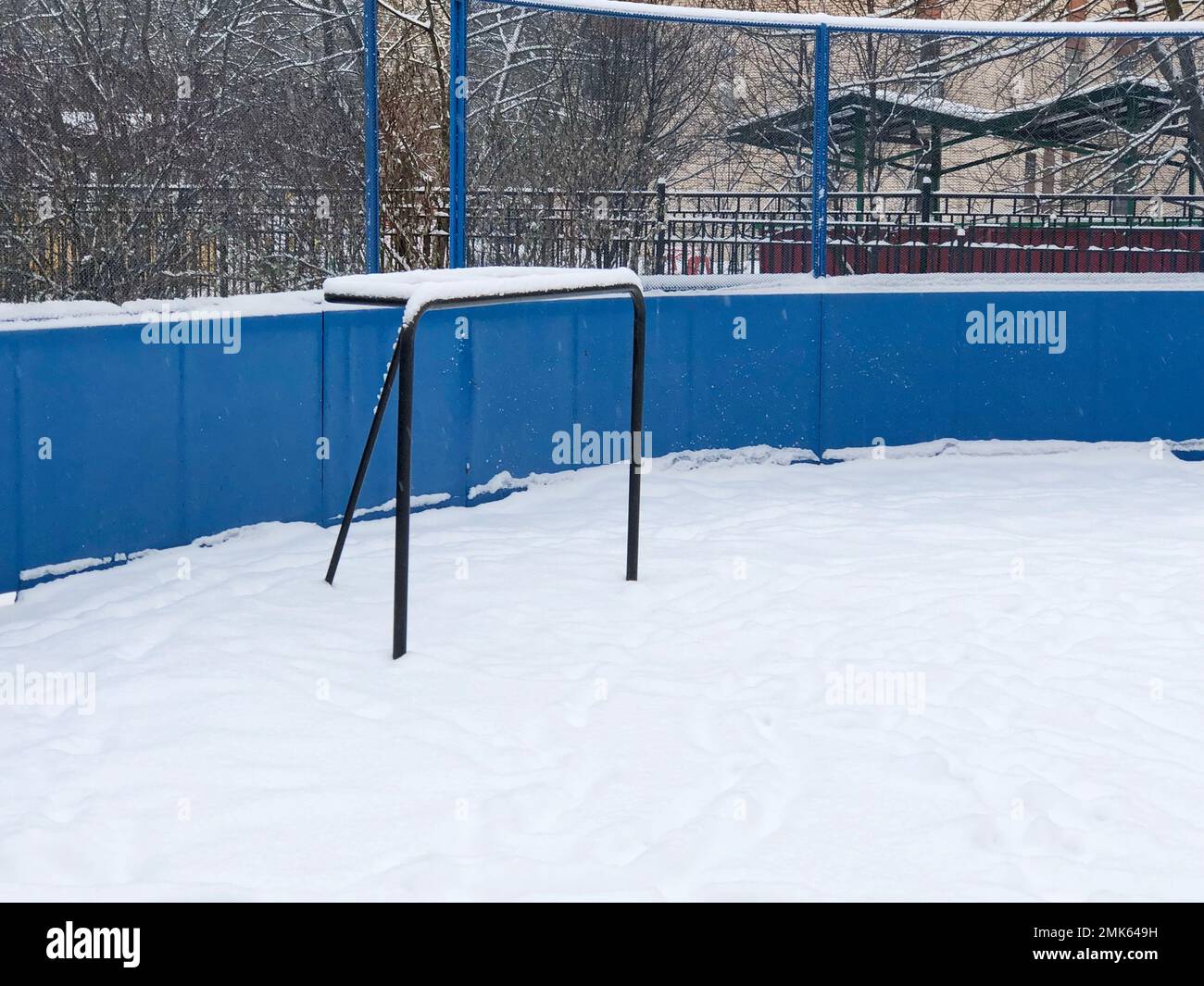 empty hockey gates on a snowy hockey rink, cold winter Stock Photo - Alamy