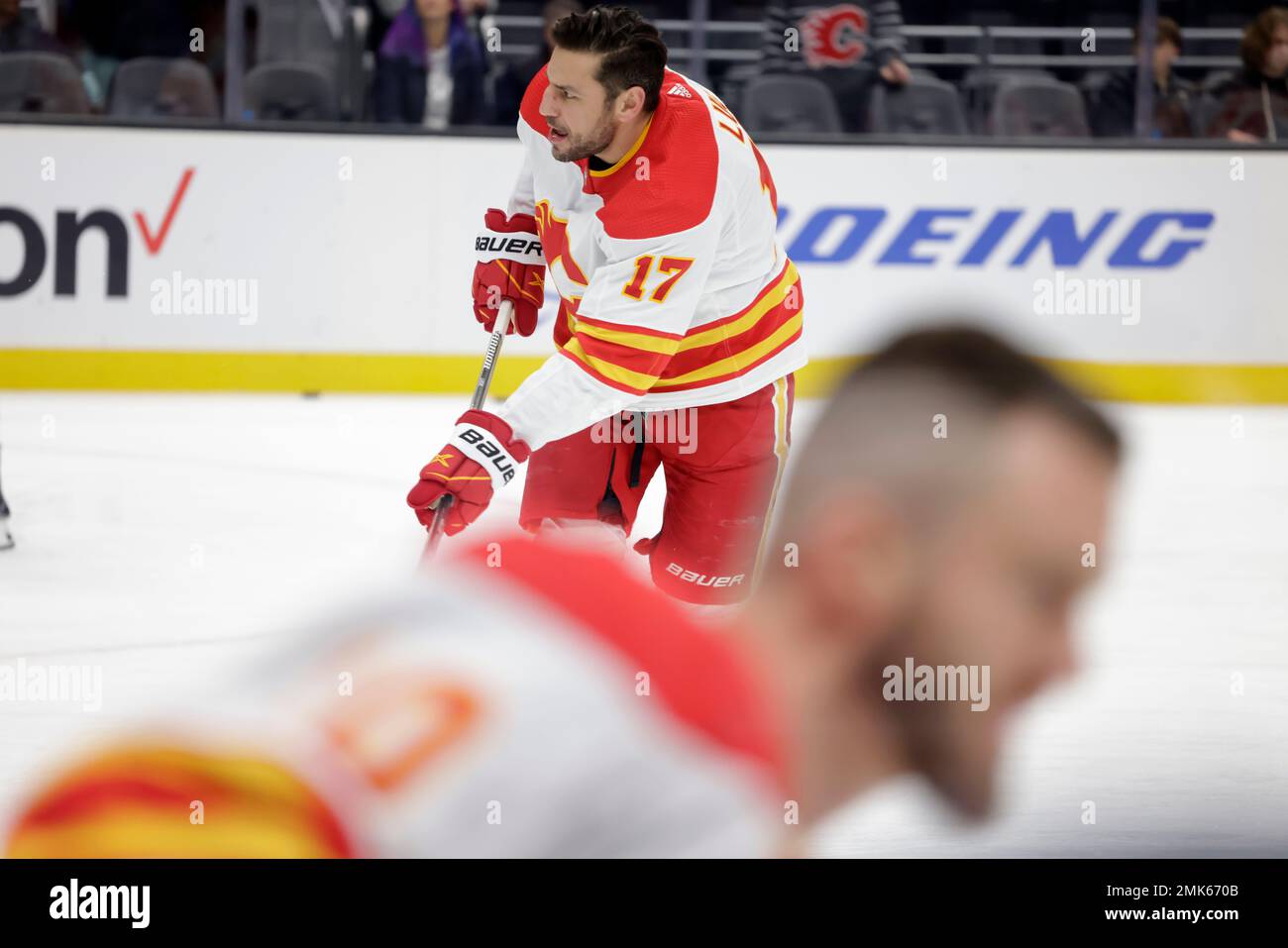 Calgary Flames left wing Milan Lucic (17) shoots during warnups before ...