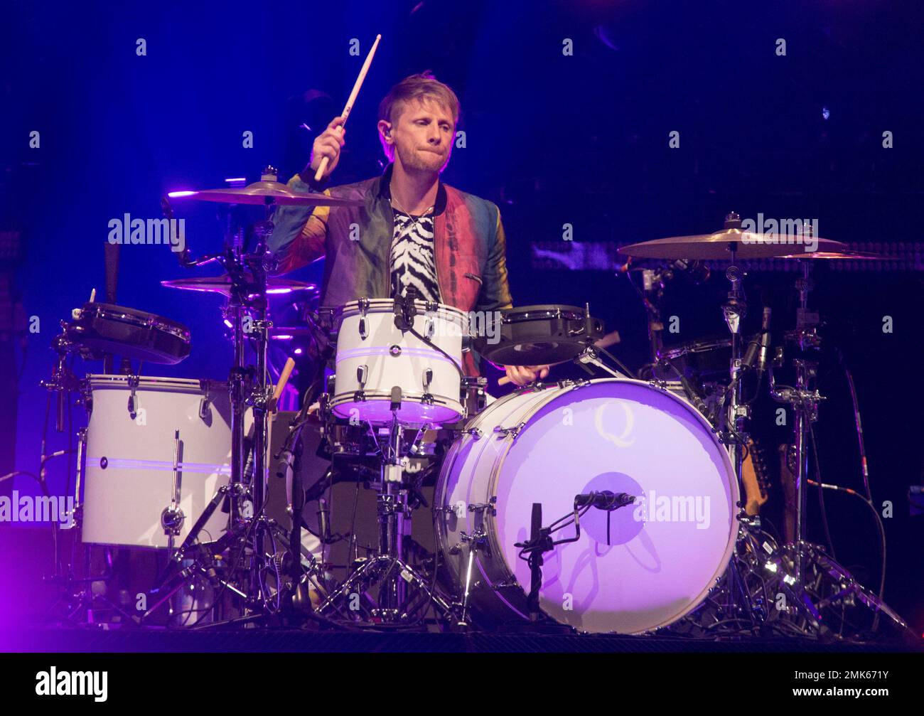 Dominic Howard of the band Muse performs in concert during their ...