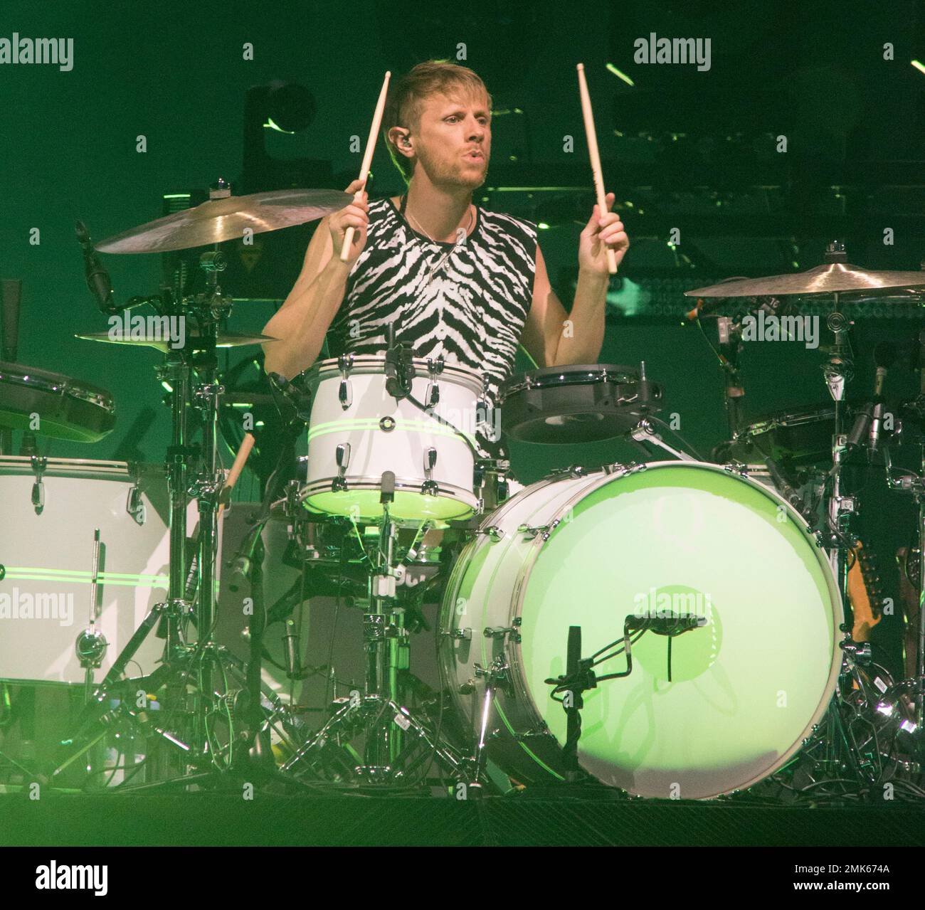 Dominic Howard of the band Muse performs in concert during their ...