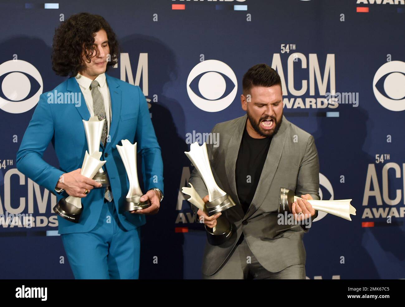 Dan Smyers, left, and Shay Mooney, of Dan + Shay, pose in the press ...