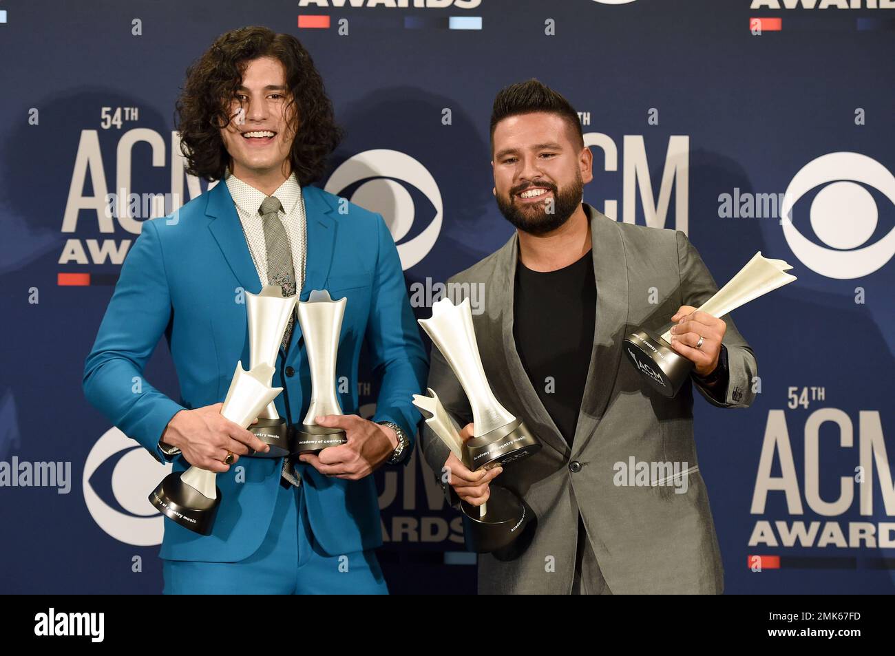Dan Smyers, left, and Shay Mooney, of Dan + Shay, pose in the press ...