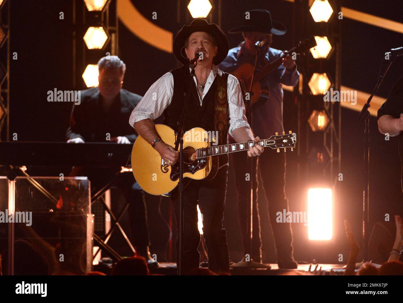 Kix Brooks, of Brooks & Dunn, performs "Brand New Man" at the 54th ...