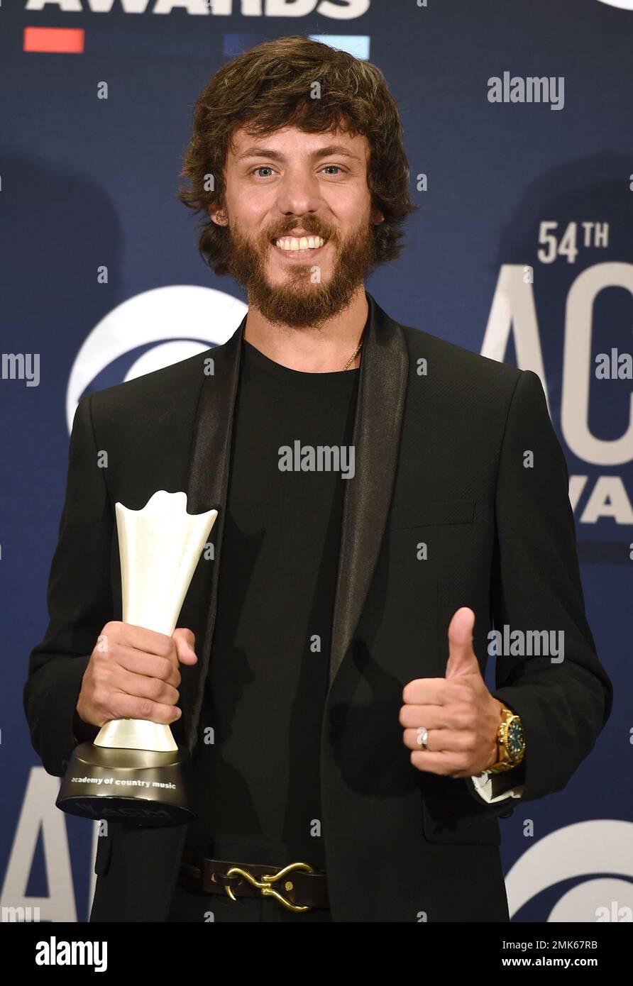 Chris Janson poses in the press room with the video of the year award ...