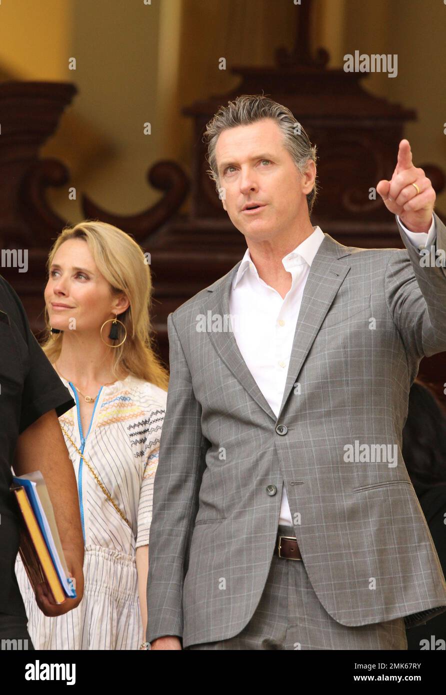California Gov. Gavin Newsom, and his wife, Jennifer Siebel Newsom walk ...