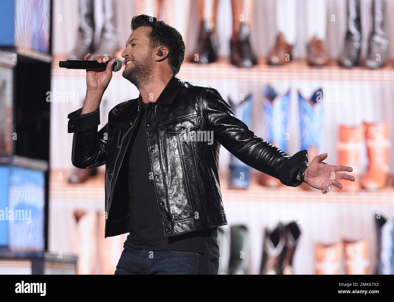 Luke Bryan performs "Knockin' Boots" at the 54th annual Academy of ...