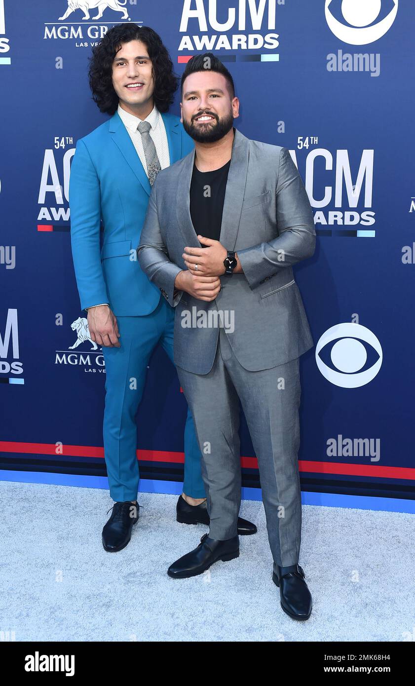 Dan Smyers, left, and Shay Mooney, of Dan + Shay, arrive at the 54th ...