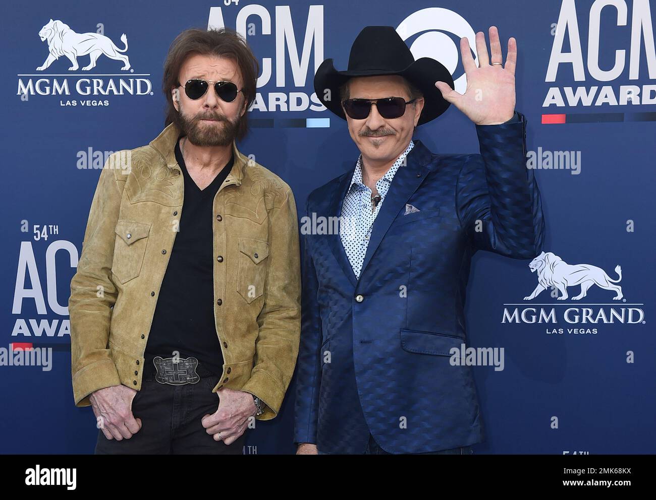 Ronnie Dunn, left, and Kix Brooks, of Brooks & Dunn, arrive at the 54th ...