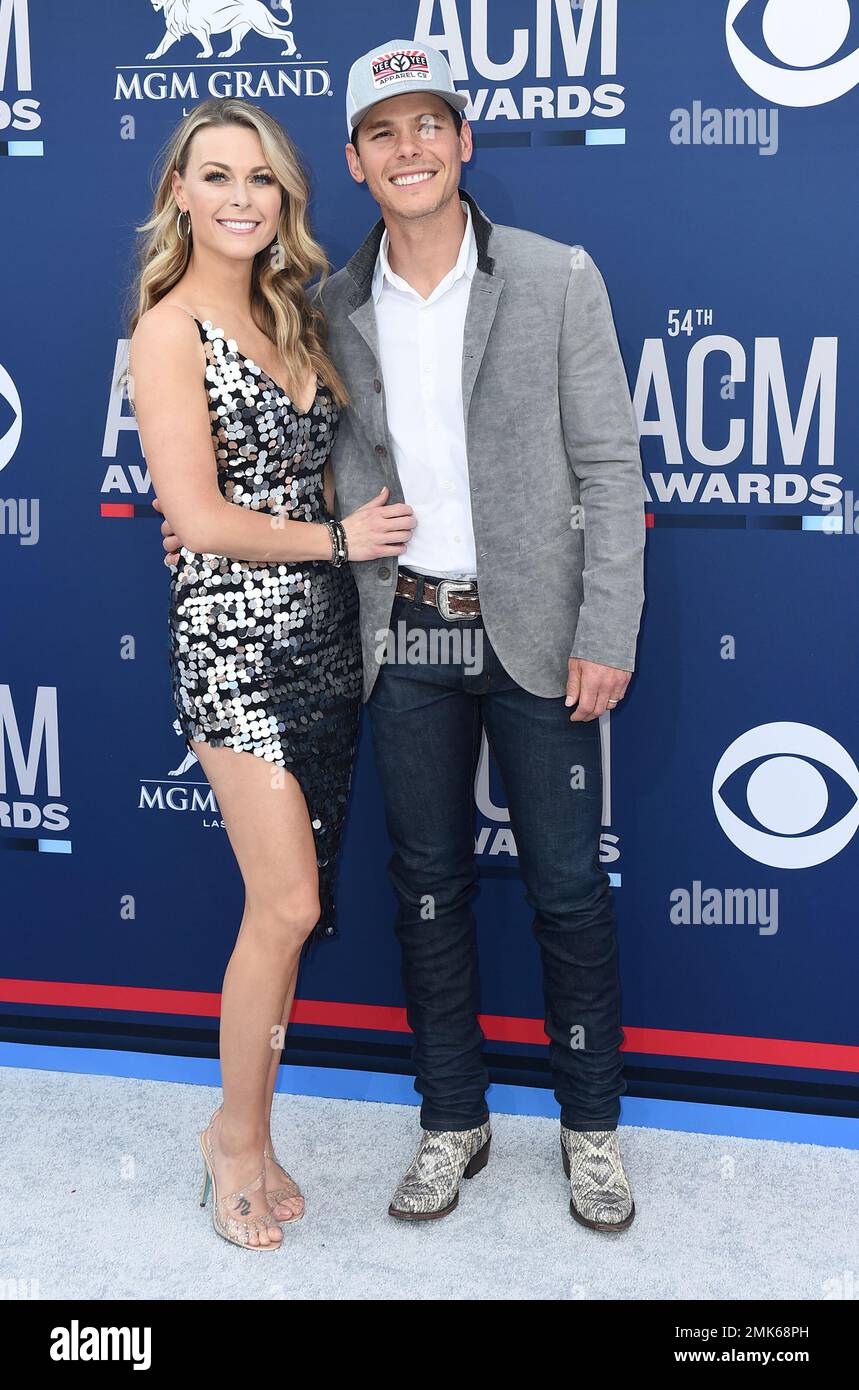 Amber Bartlett, left, and Granger Smith arrive at the 54th annual ...