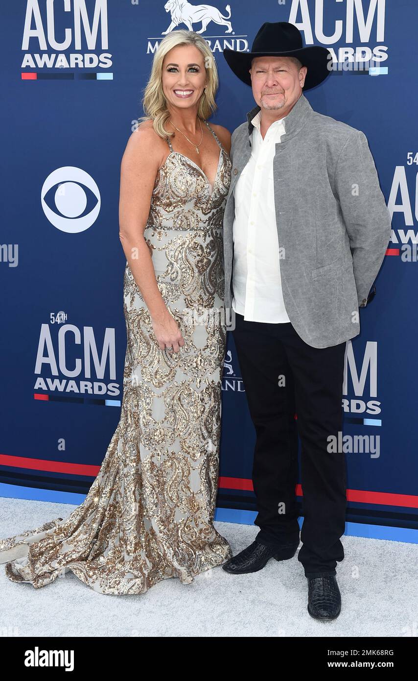 Tracy Lawrence, right, and Becca Lawrence arrive at the 54th annual ...