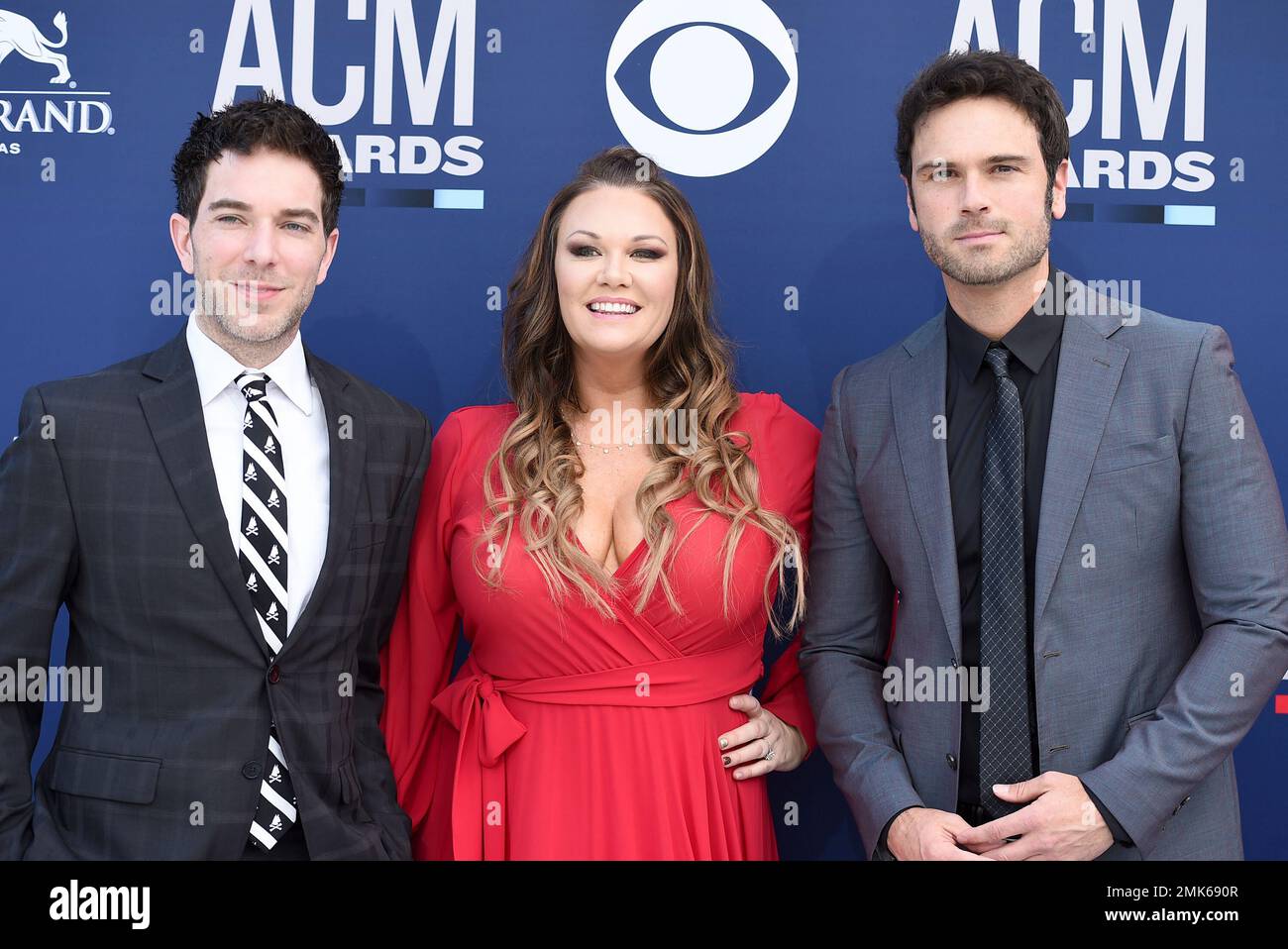 Ty Bentli, from left,Tricia Jenkins and Chuck Wicks arrive at the 54th ...