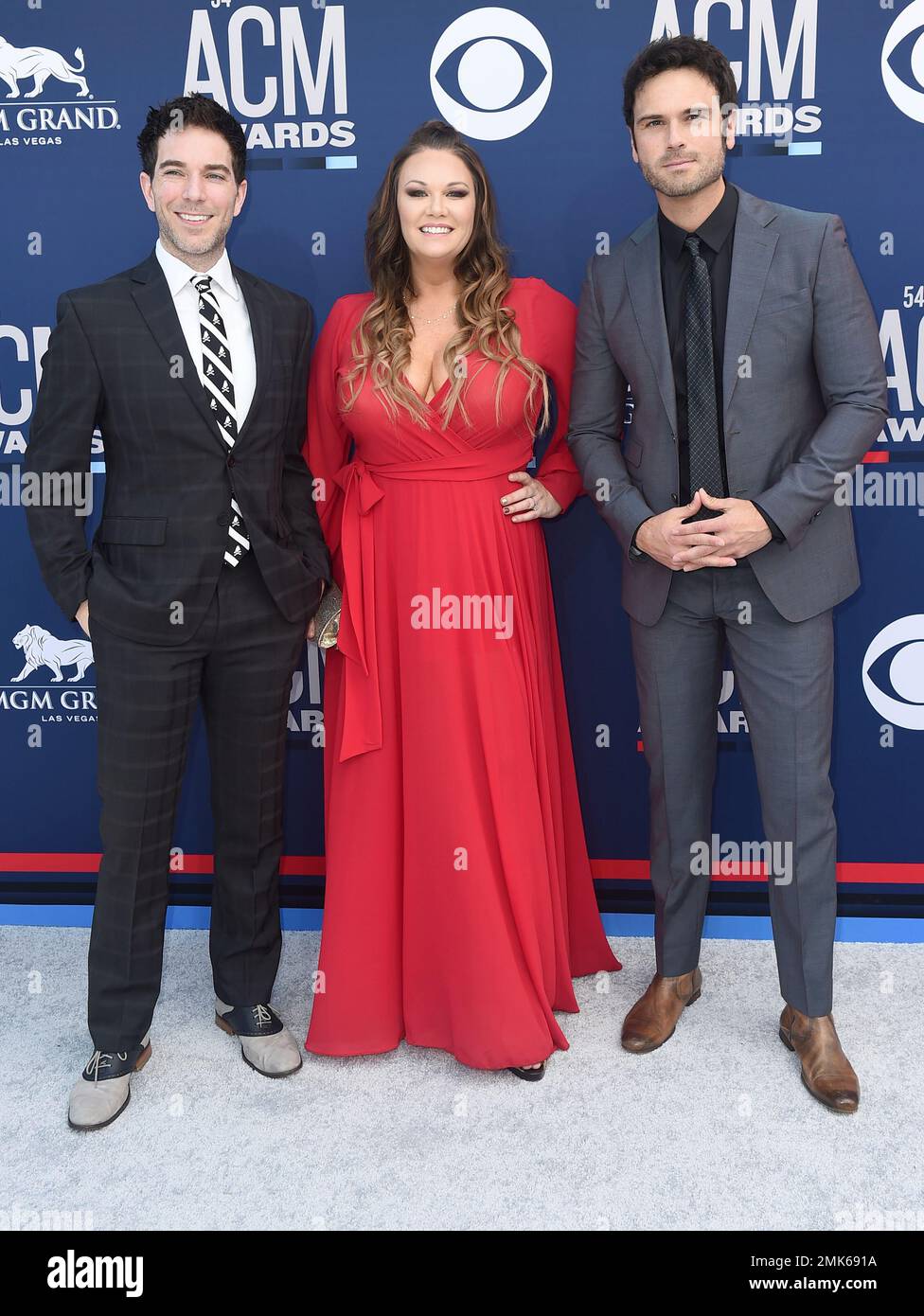 Ty Bentli, from left,Tricia Jenkins and Chuck Wicks arrive at the 54th ...