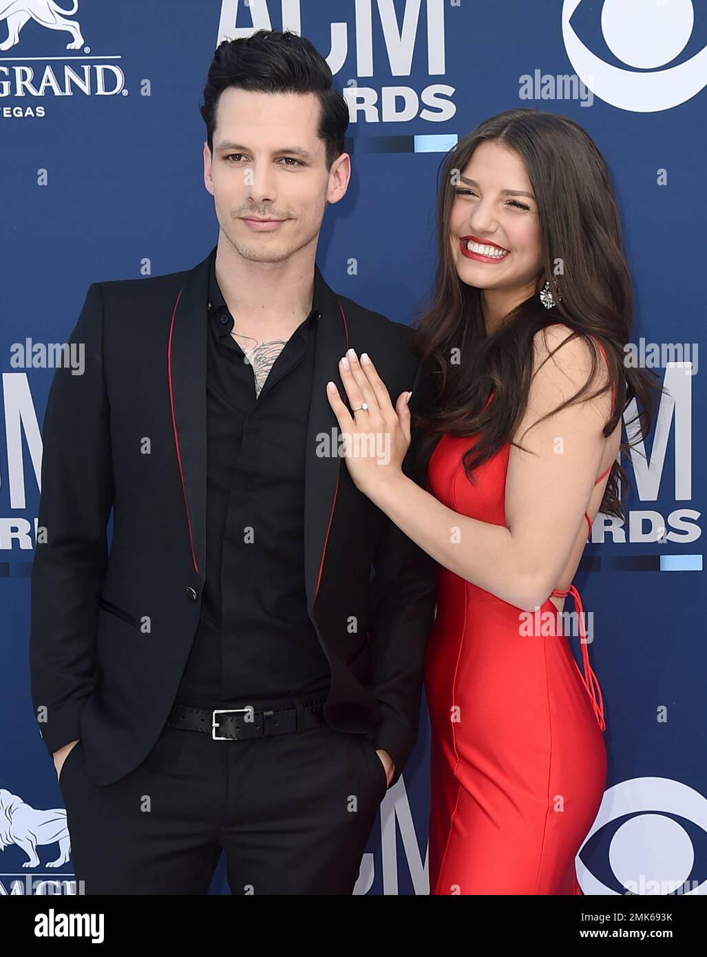 Devin Dawson, left, and Leah Sykes arrive at the 54th annual Academy of ...