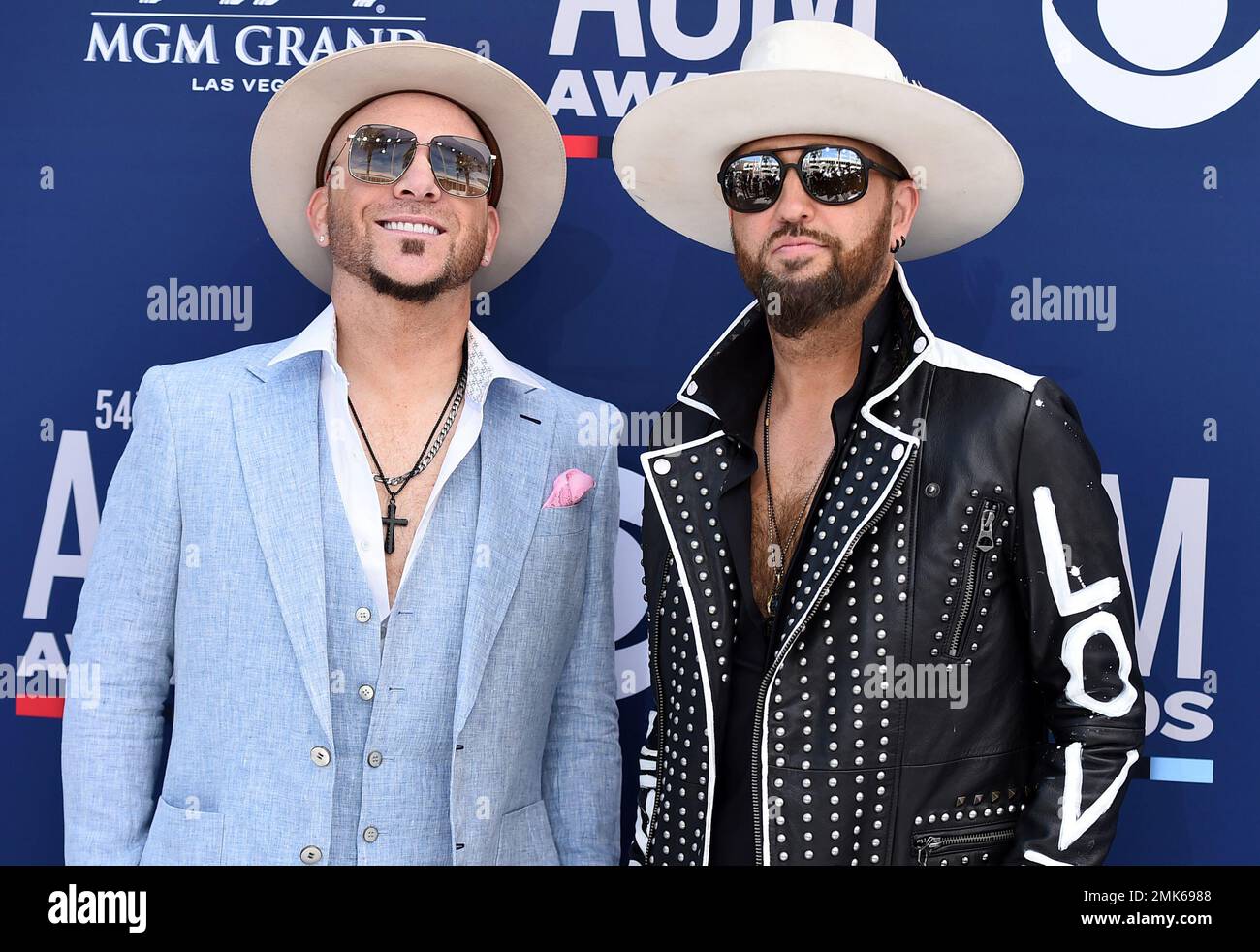 Chris Lucas, left, and Preston Brust, of LOCASH, arrive at the 54th ...