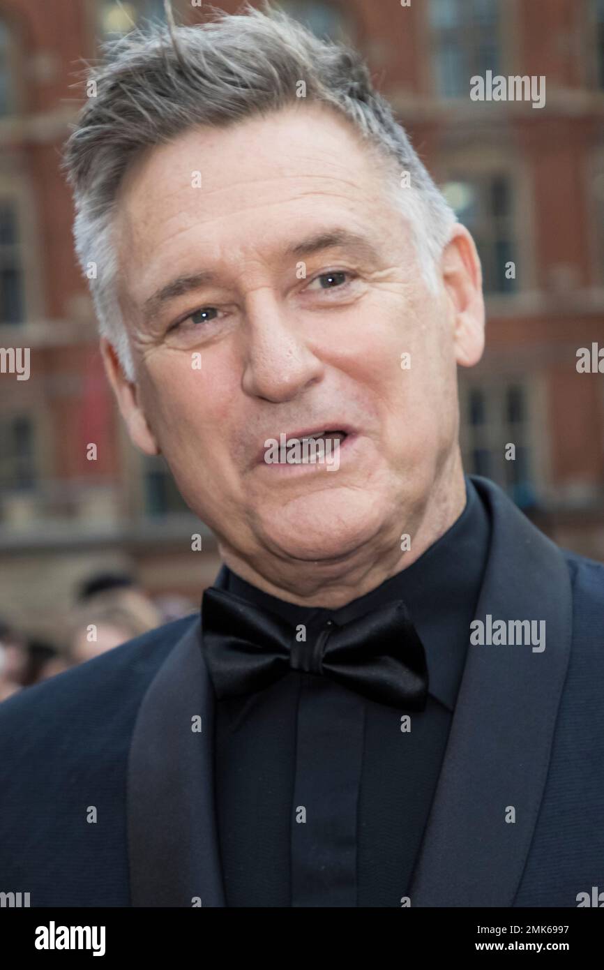 Bill Pullman poses for photographers upon arrival at the Olivier Awards ...