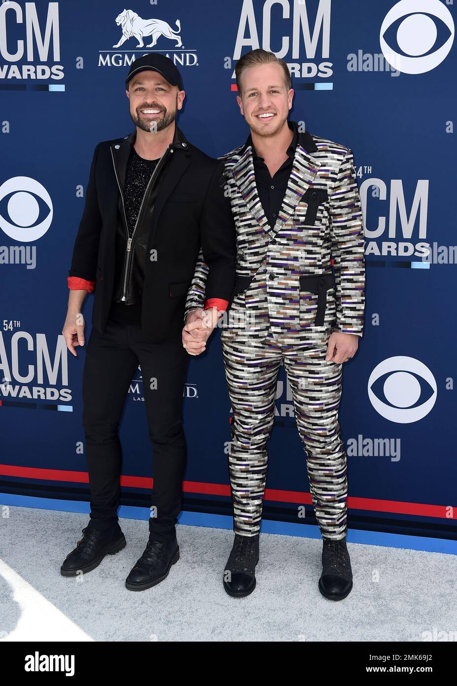 Cody Alan, left, and Michael Trea Smith arrive at the 54th annual ...