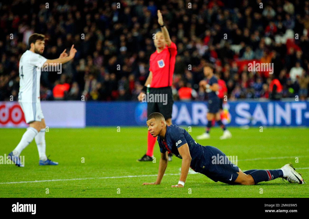 PSG's Kylian Mbappe gets up from the floor during the French League One ...