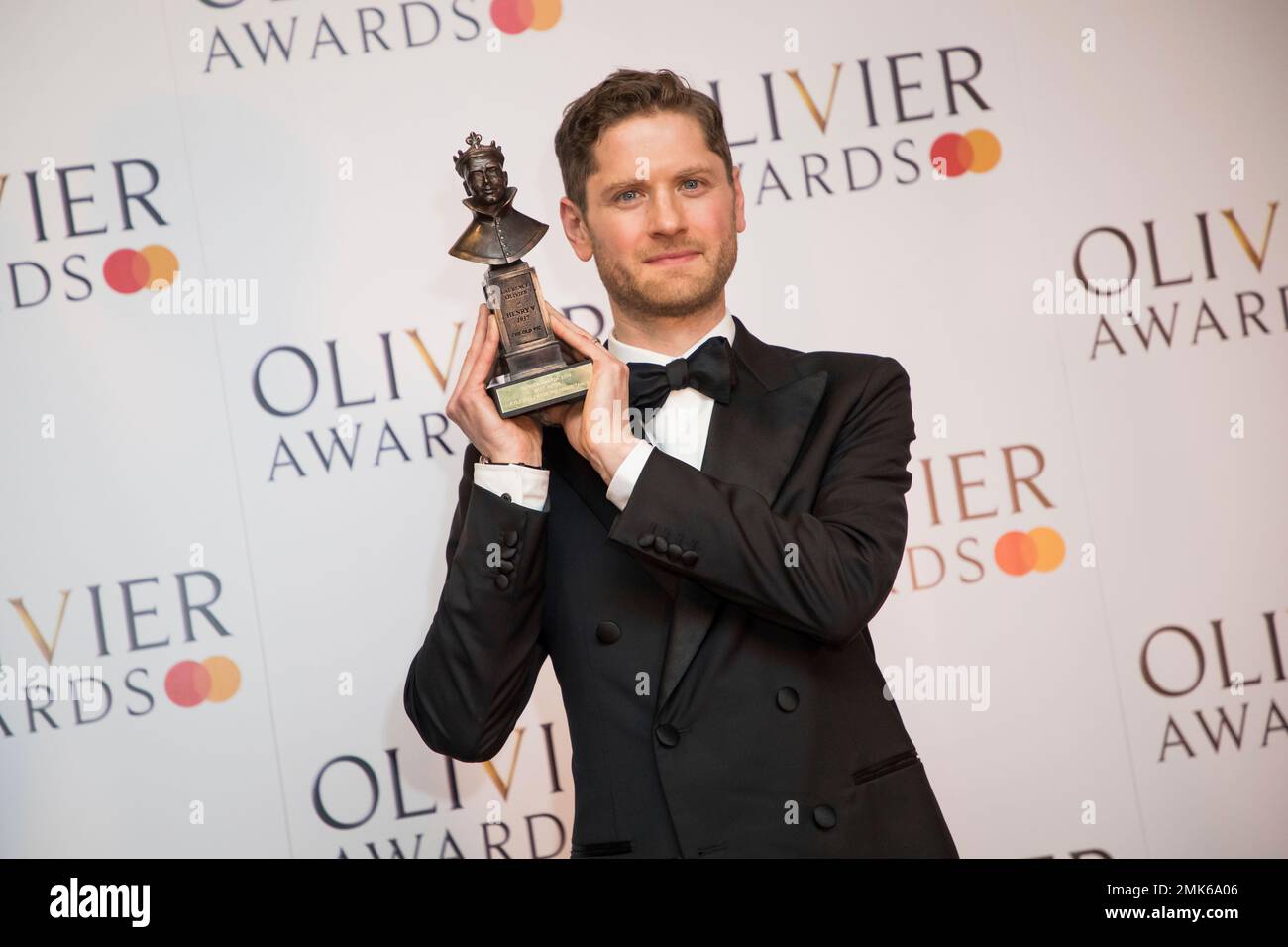 Actor Kyle Soller poses for photographers backstage with his Best Actor ...