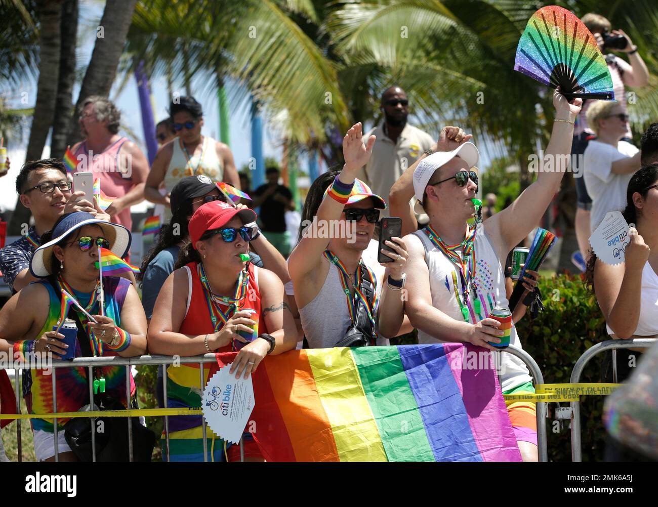 People watch as the 11th annual Pride Parade does down Ocean Drive, as ...