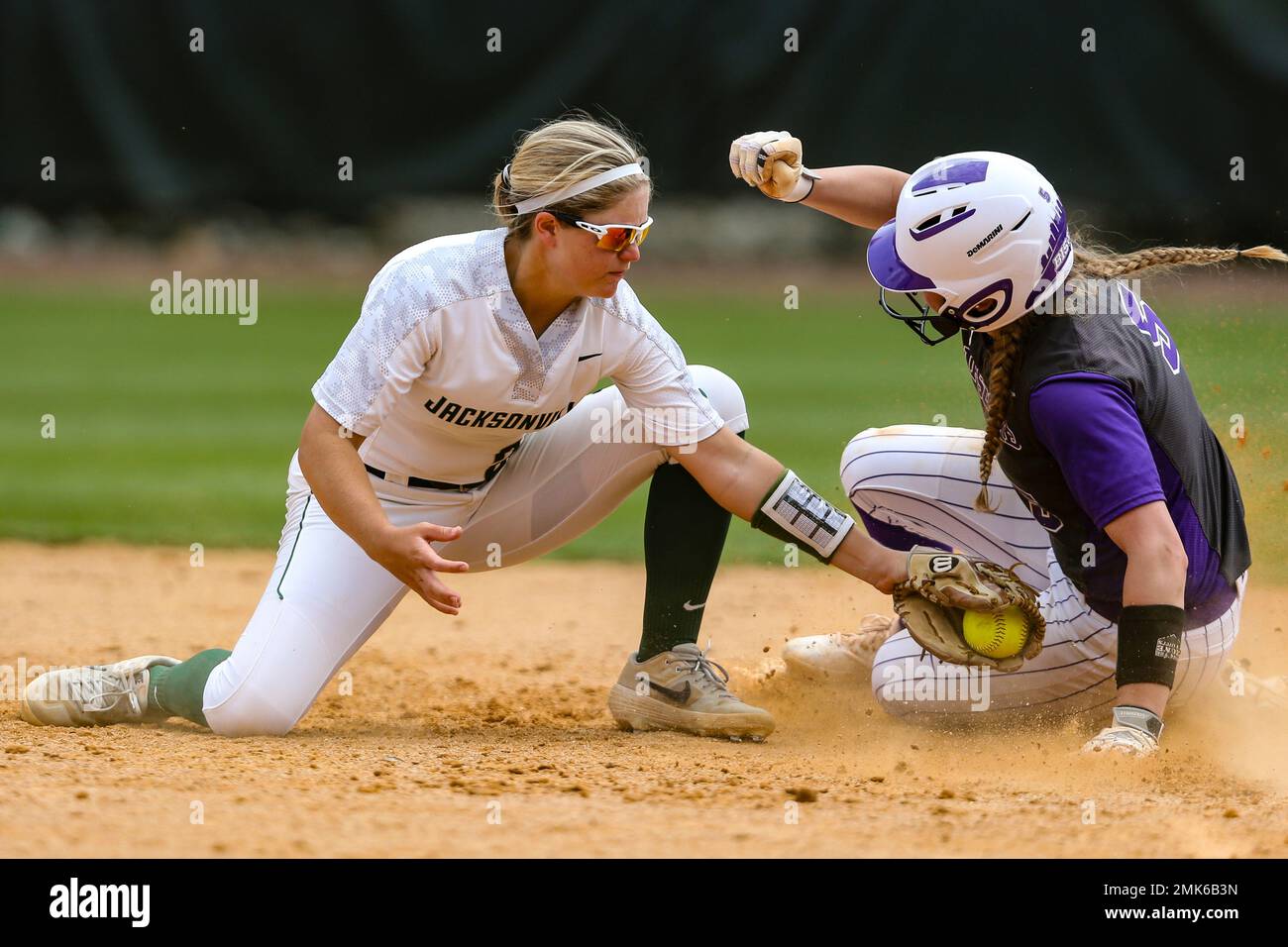 Jacksonville's Haley Holloway (20) misses with the tag of Lipscomb's ...