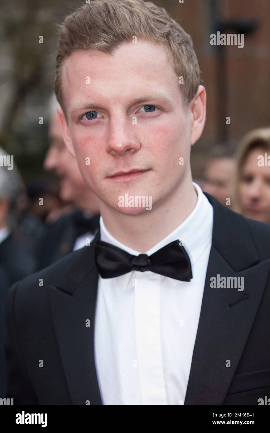 Actor Patrick Gibson poses for photographers upon arrival at the ...