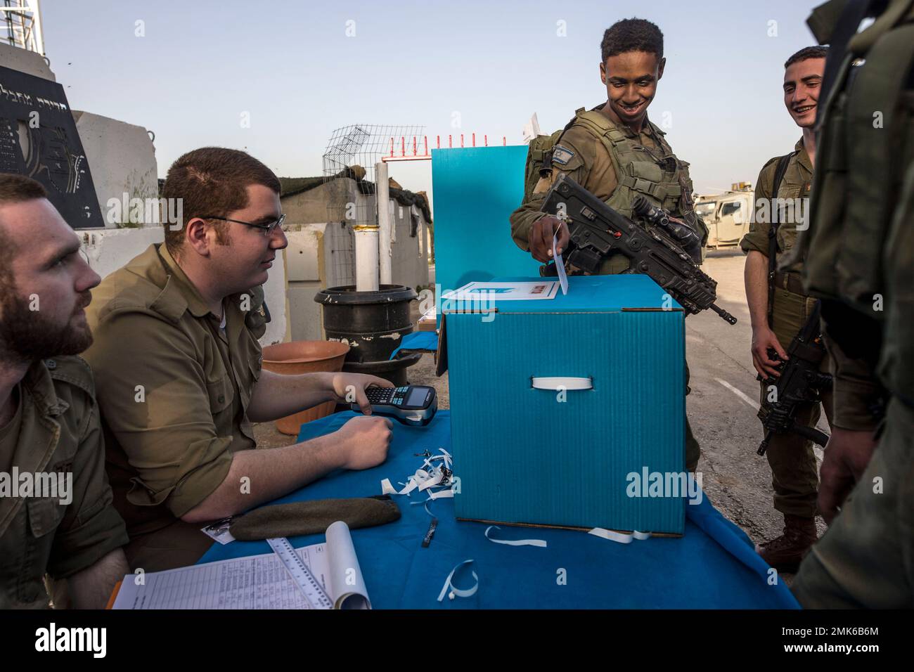 Israeli soldiers cast their ballots oat a mobile voting booth, two days ...