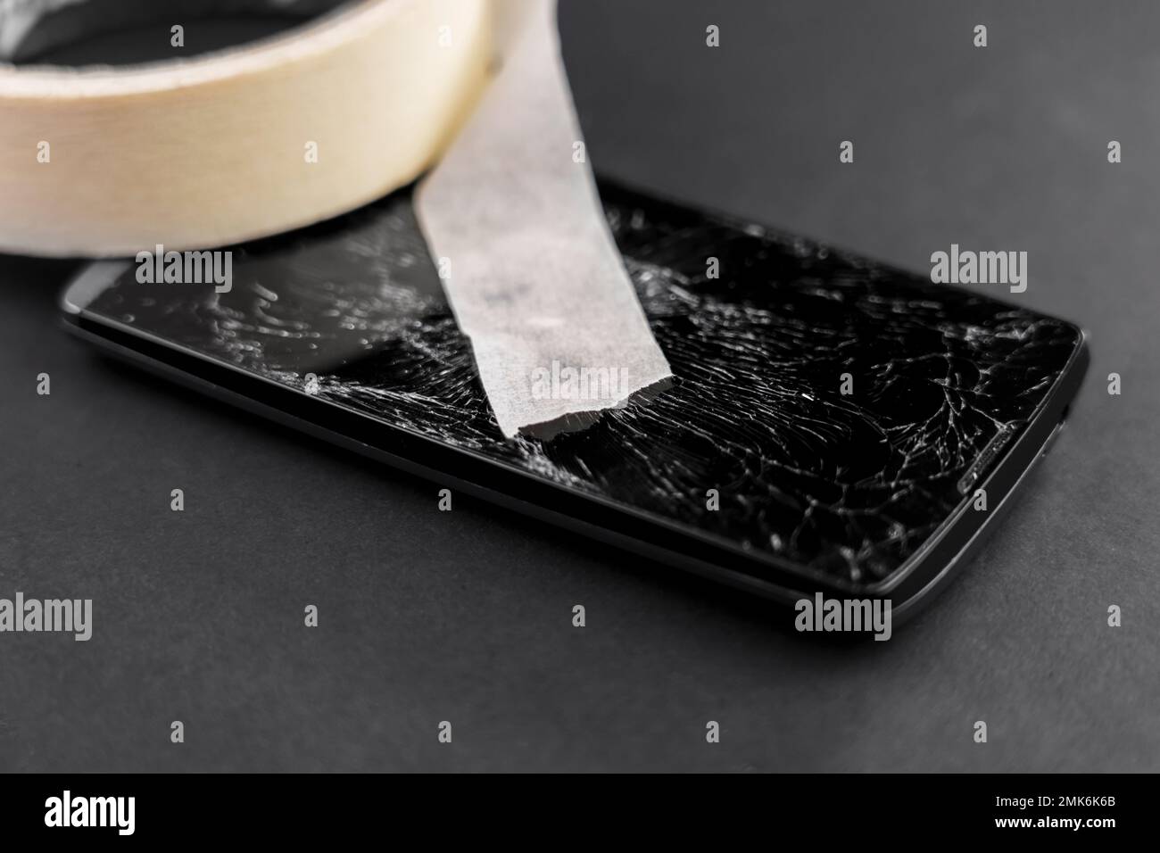 Broken smartphone with crushed touch screen display repaired with ...