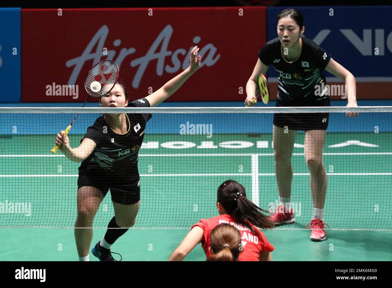 South Korea's Baek Ha Na, left, and Kim Hye Rin return a shot to ...