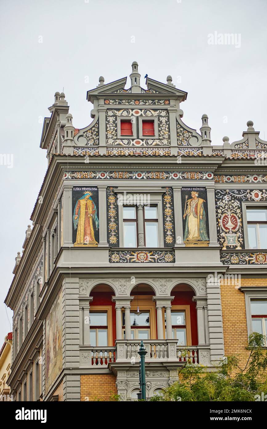 Art decorated building in Prague. We see frescoes, ornaments and a ...